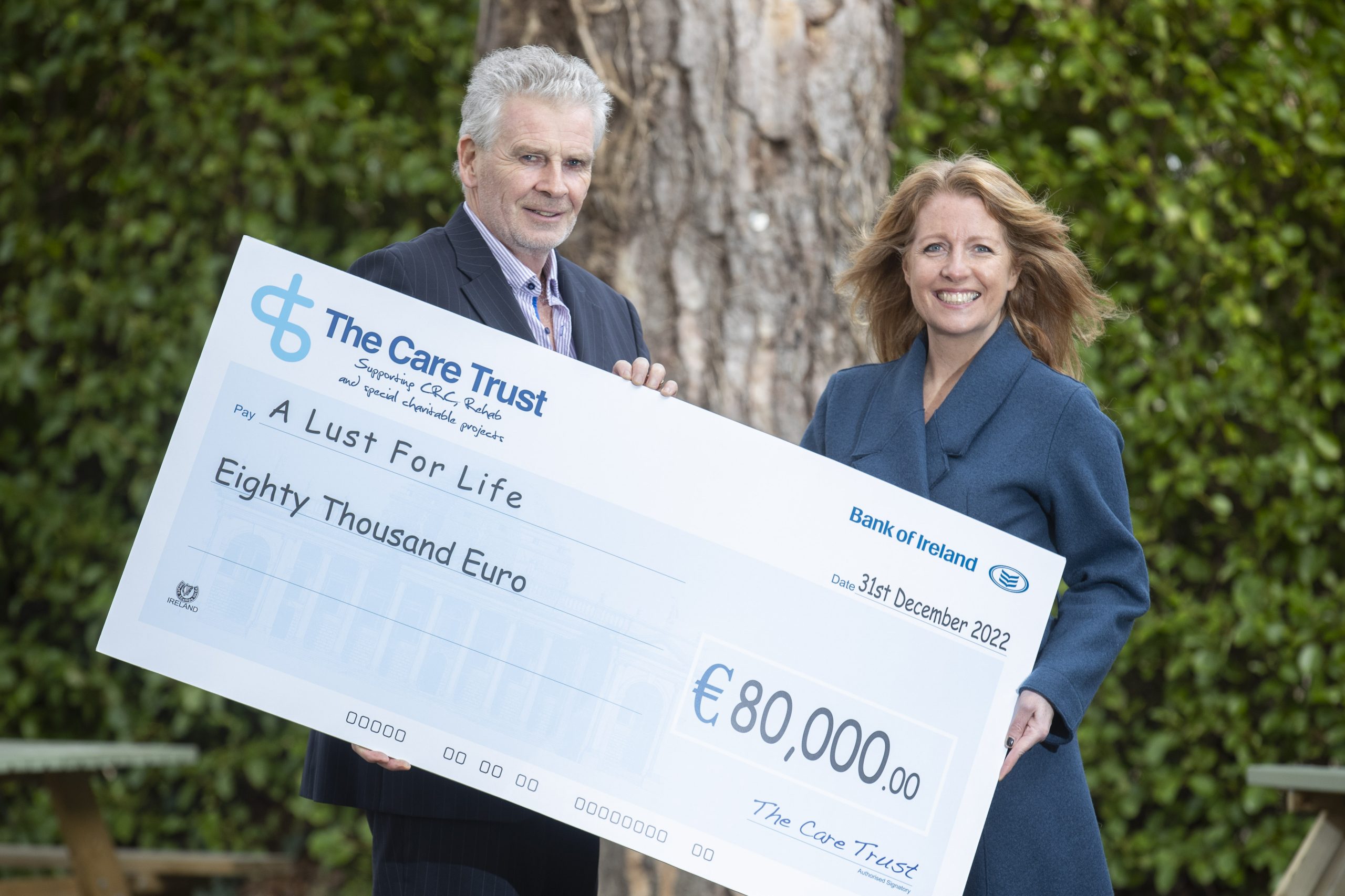 Senan Mullins presents a cheque to Bernie Keogh, Managing Director ...